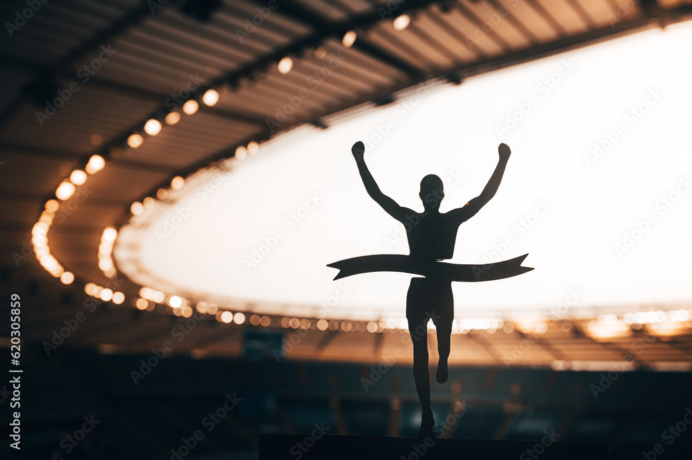 Conquering the Finish Line: Silhouetted Runner's Victory Stirs the ...