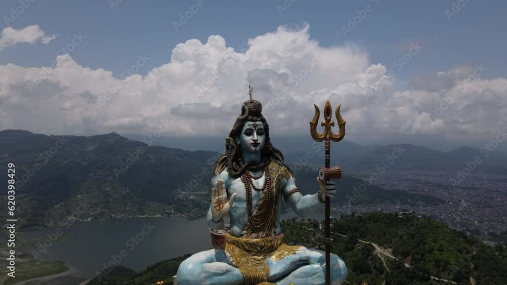 Aerial view of the big statue of Lord Shiva in Nepal. Drone flight with ...