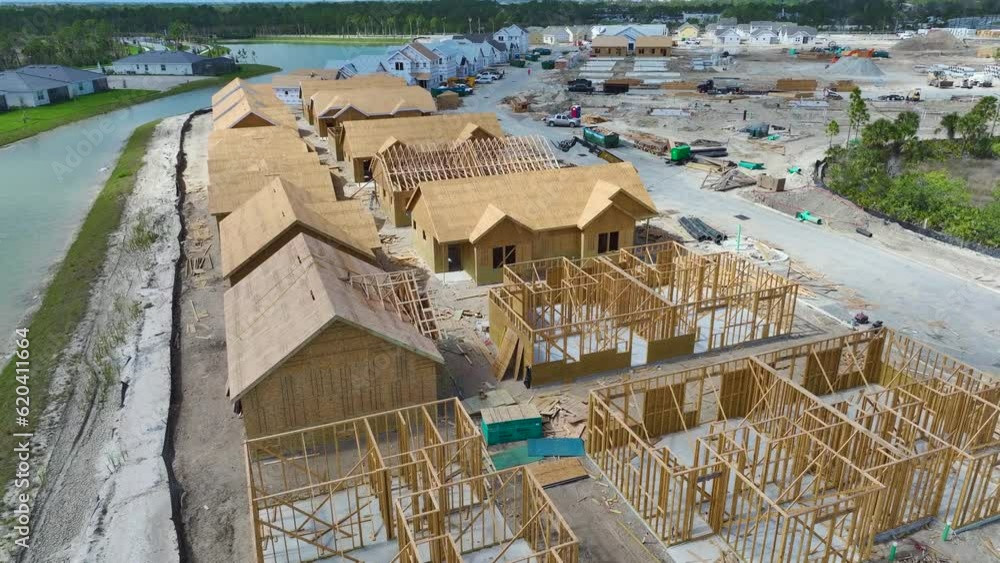 Wooden frames of new cheap american homes under construction ...