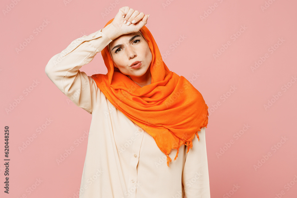 Young sick ill tired sad arabian asian muslim woman wears orange abaya ...