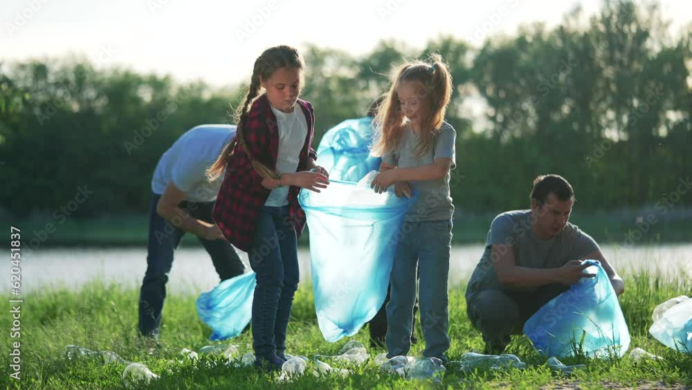 saving nature garbage collection. a group of volunteers save ...