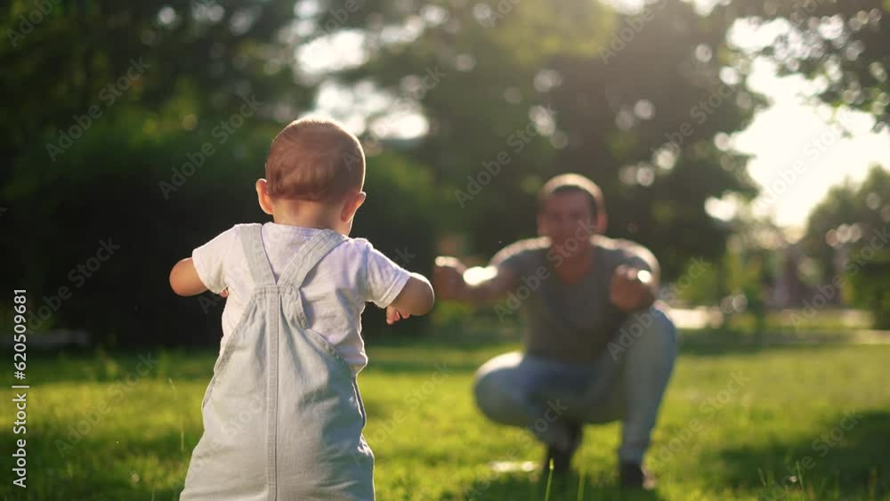 Wideo Stock: baby first steps. happy family a kid dream concept. baby ...