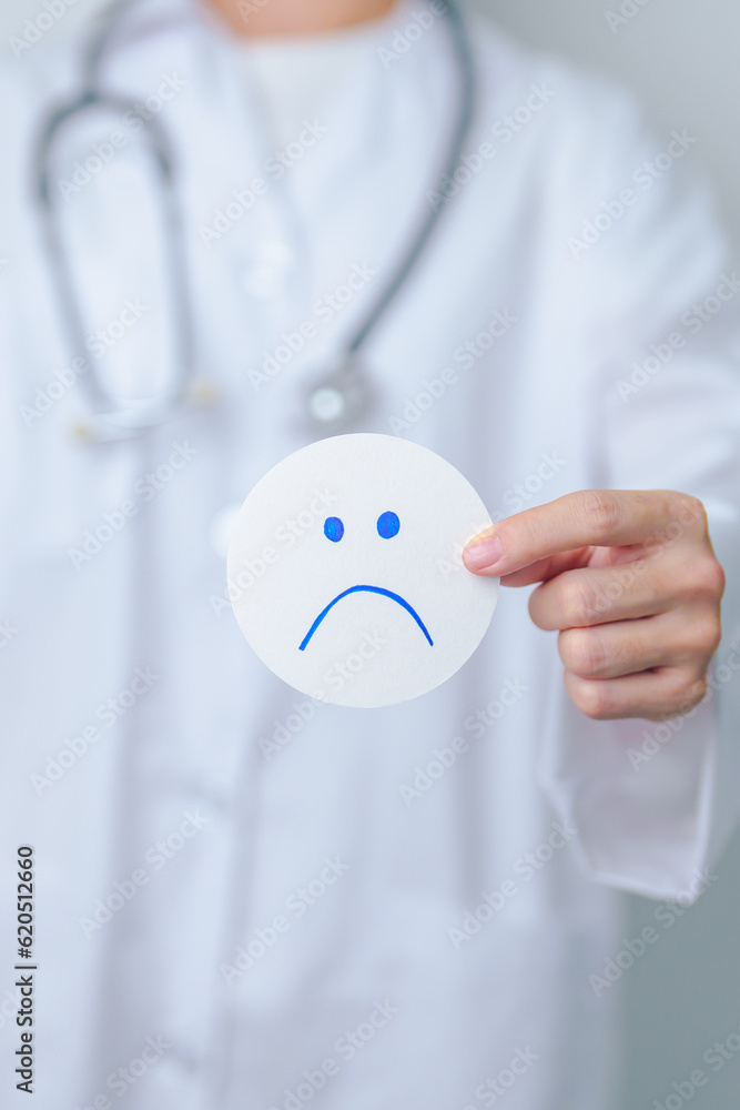 Doctor show Unhappy sad face paper, Mental health Assessment ...