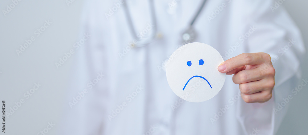 Doctor show Unhappy sad face paper, Mental health Assessment ...