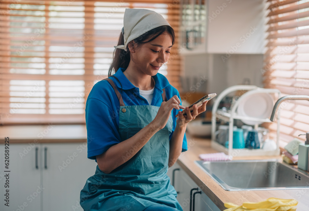 Enthusiastic house cleaning lady do various tasks with responsibility ...