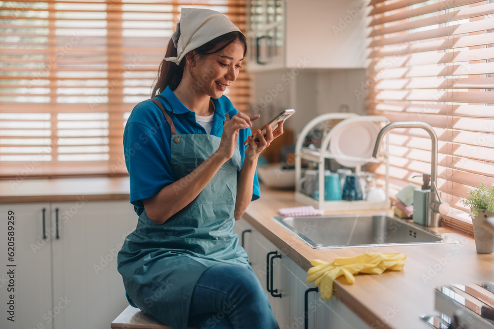 Enthusiastic house cleaning lady do various tasks with responsibility ...