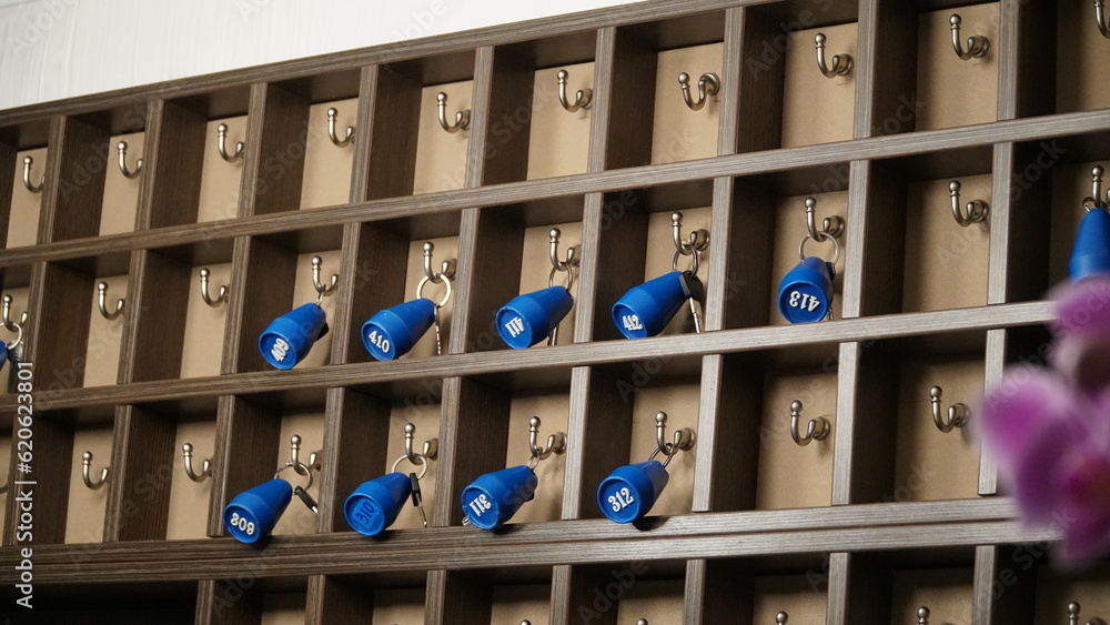 hotel room keys at reception desk counter Stock Photo | Adobe Stock