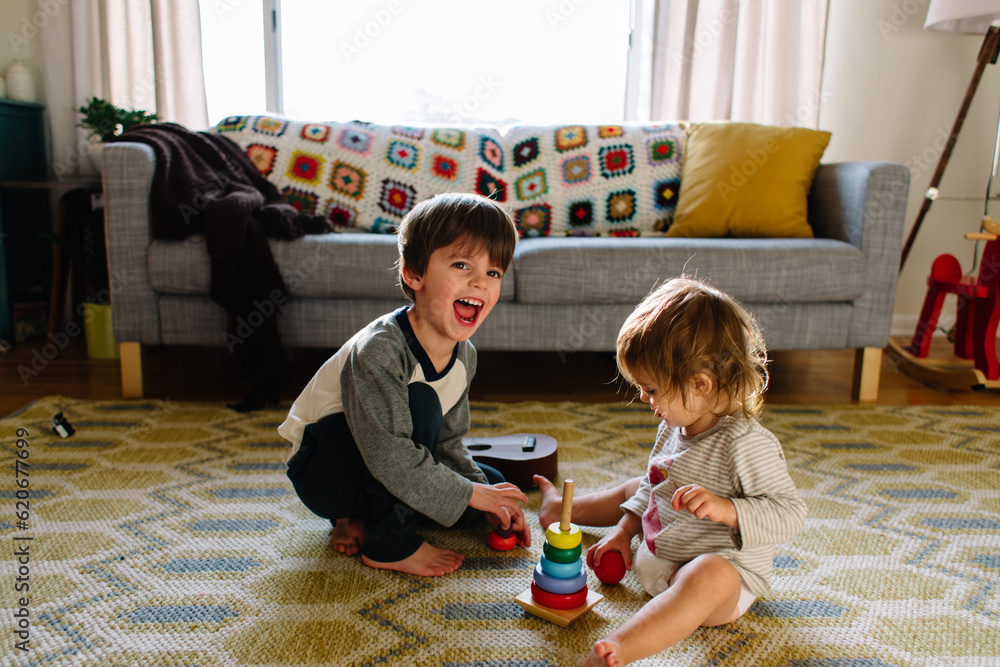 siblings play in home together Stock Photo | Adobe Stock