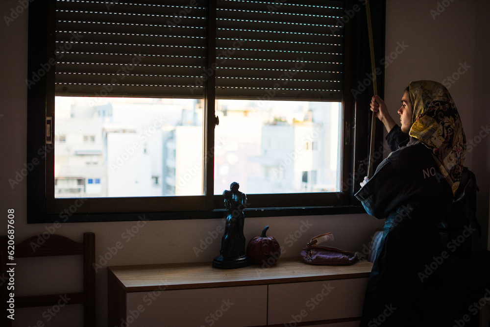 Person closing a window of a bedroom Stock Photo | Adobe Stock