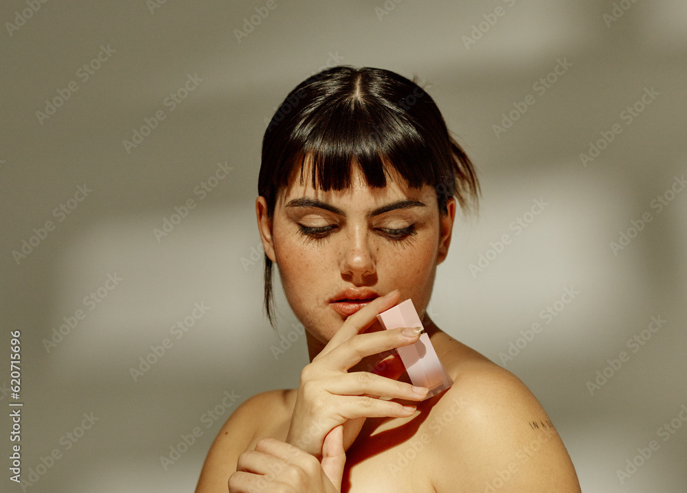 Natural makeup portrait over grey background Stock Photo | Adobe Stock