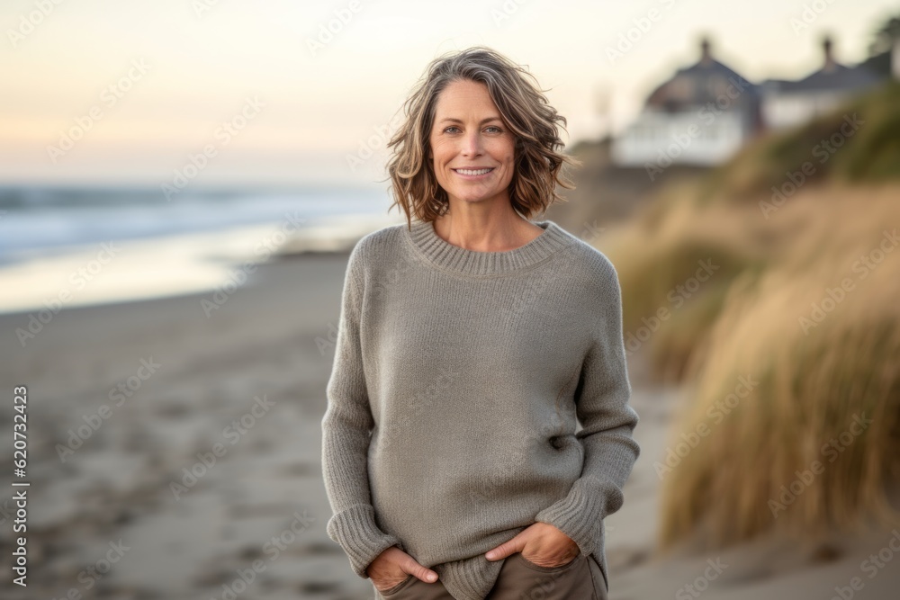 Lifestyle portrait photography of a satisfied woman in her 40s wearing ...