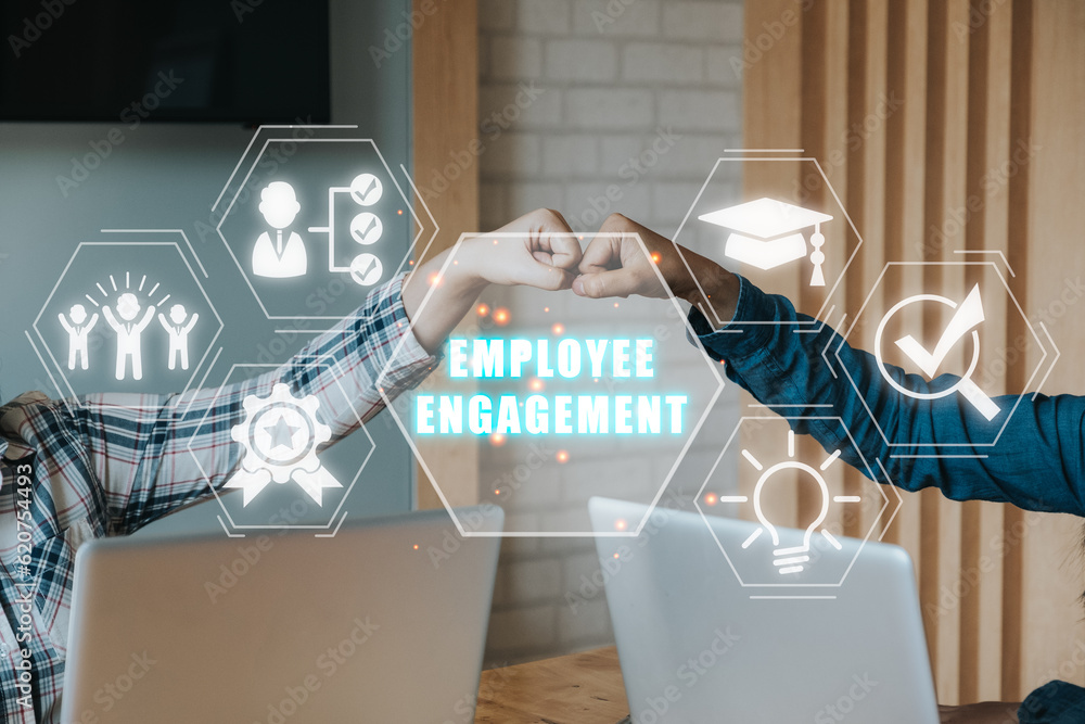 Employee engagement and team motivation, Business team giving fist bump ...