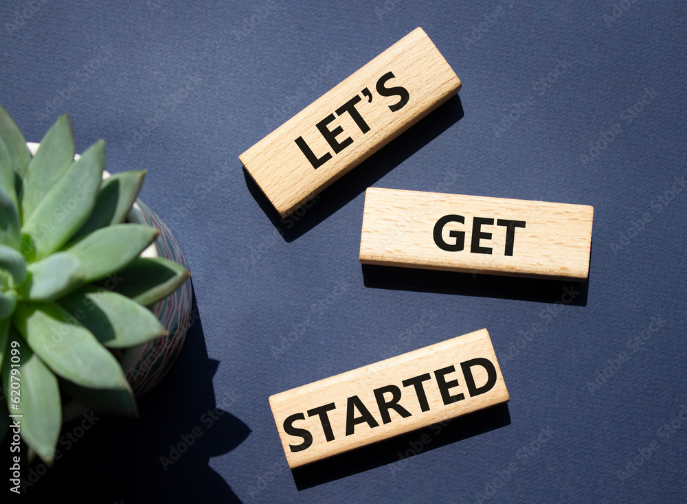 Lets get started symbol. Concept words Lets get started on wooden ... Lets get started symbol. Concept words Lets get started on wooden ...