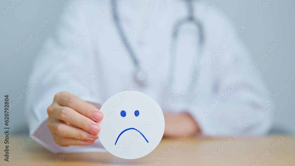 Doctor show Unhappy sad face paper, Mental health Assessment ...