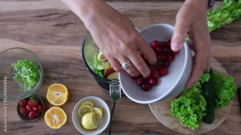 Healthy smoothie ingredients on table and blender bowl, top view ...