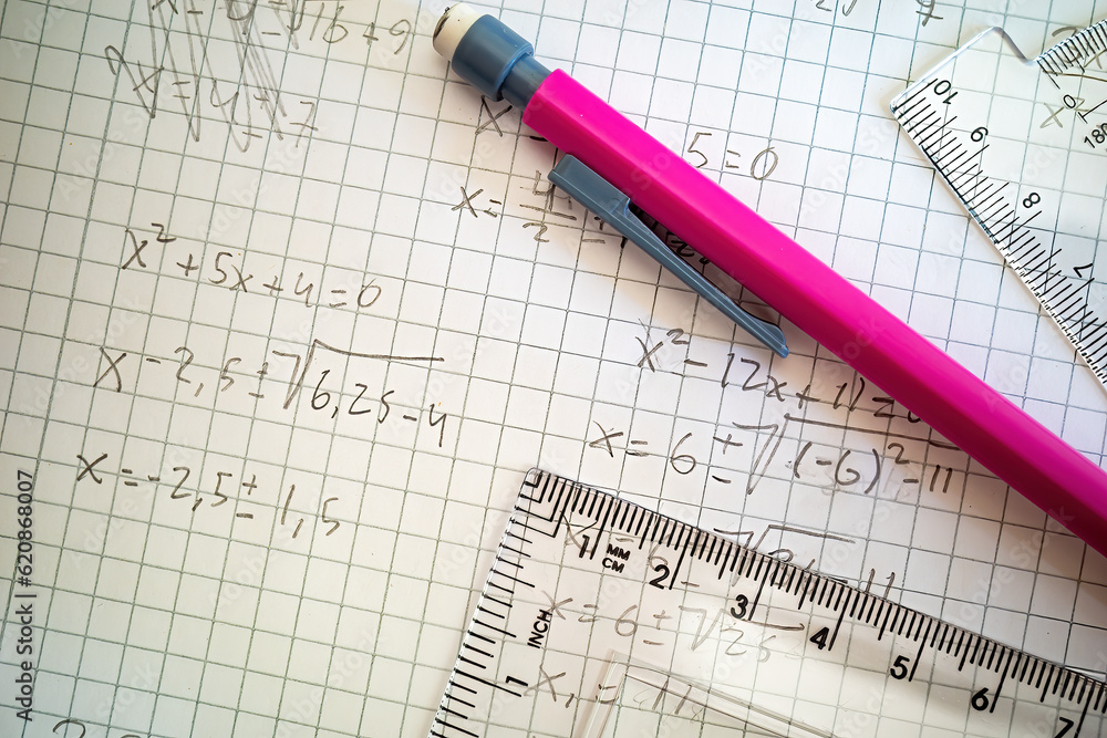 Stockholm, Sweden Mathematics equations on apiece of paper with a pen ...