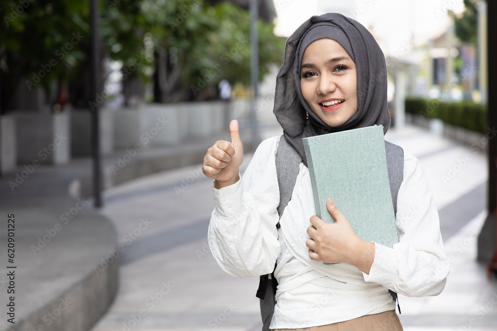 Muslim College Student giving approving thumb up gesture for Unlocked achievement, Inspiring ...
