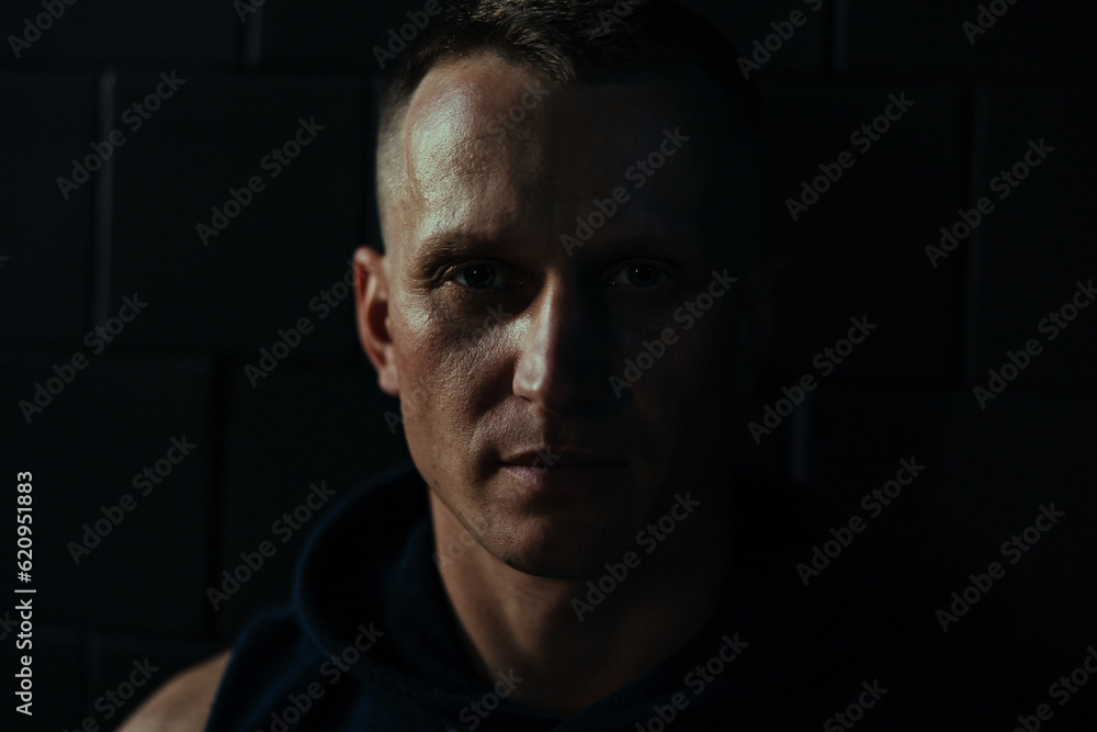 Split light portrait with light and shadow of man. Stock Photo | Adobe ...