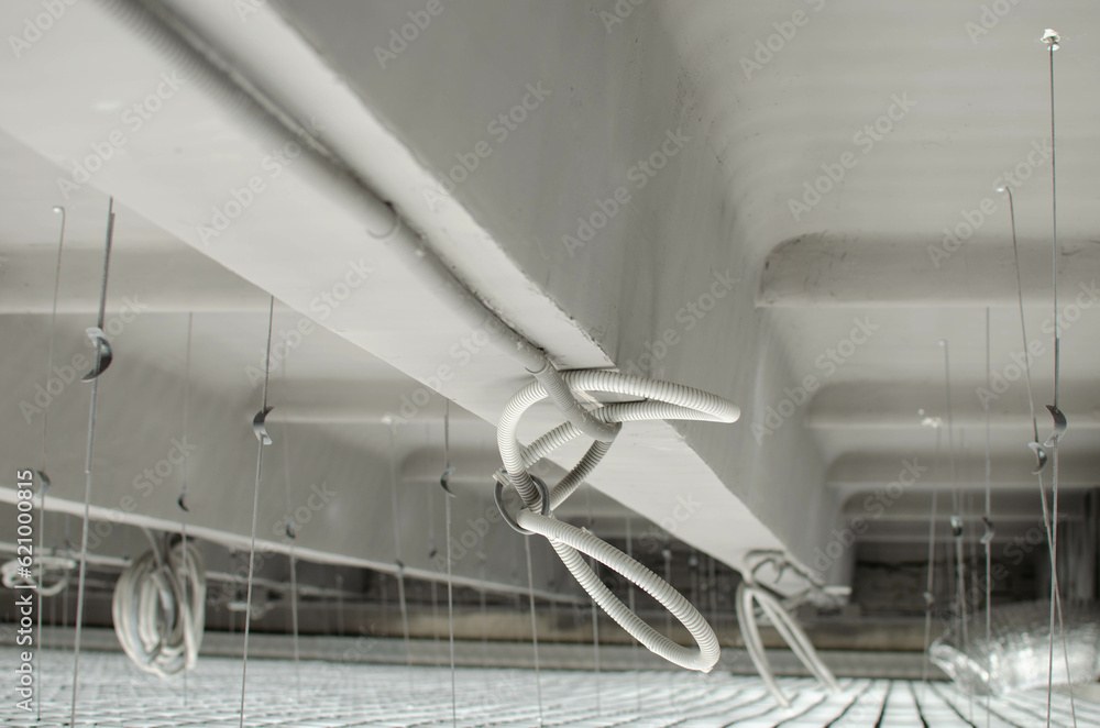 nsulated electrical cables laid above the suspended ceiling.suspensions ...