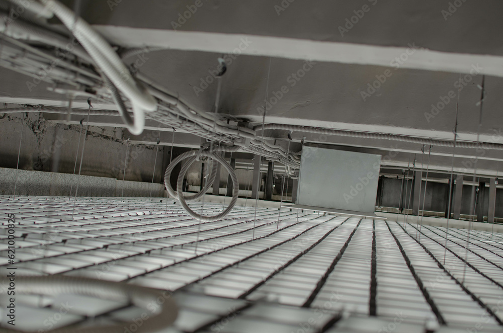 nsulated electrical cables laid above the suspended ceiling.suspensions ...