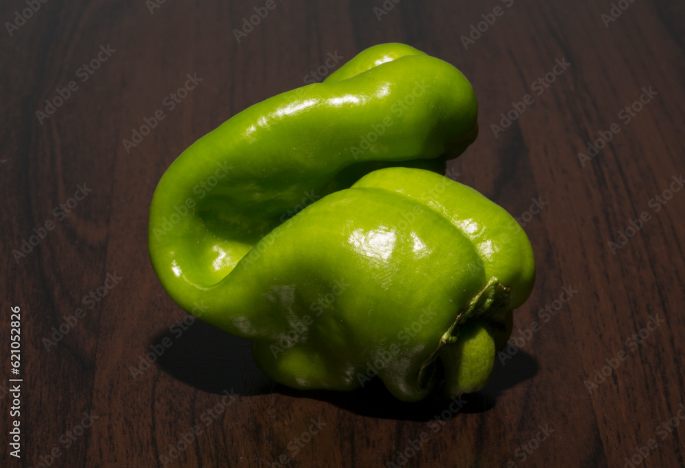 Green bell pepper (also known as sweet pepper, or capsicum) is the ...