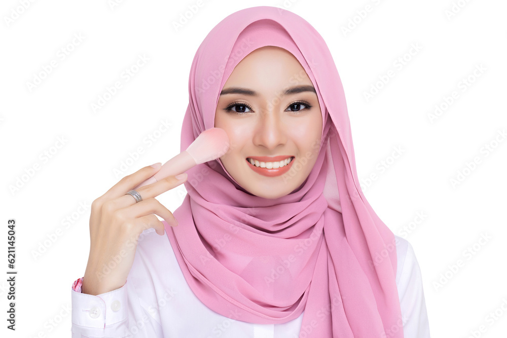 Close up young beautiful muslim woman with hijab applying makeup with ...