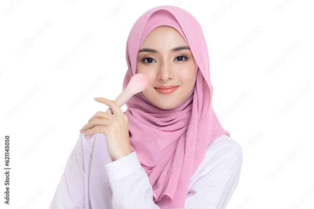 Close up young beautiful muslim woman with hijab applying makeup with ...