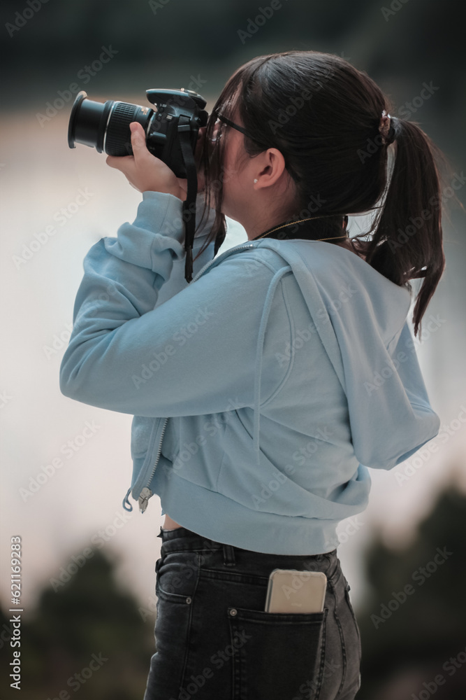 Photograph of a person photographing the landscape, real person ...