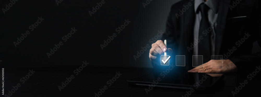 Person with hologram showing a list of options, businessman putting a ...