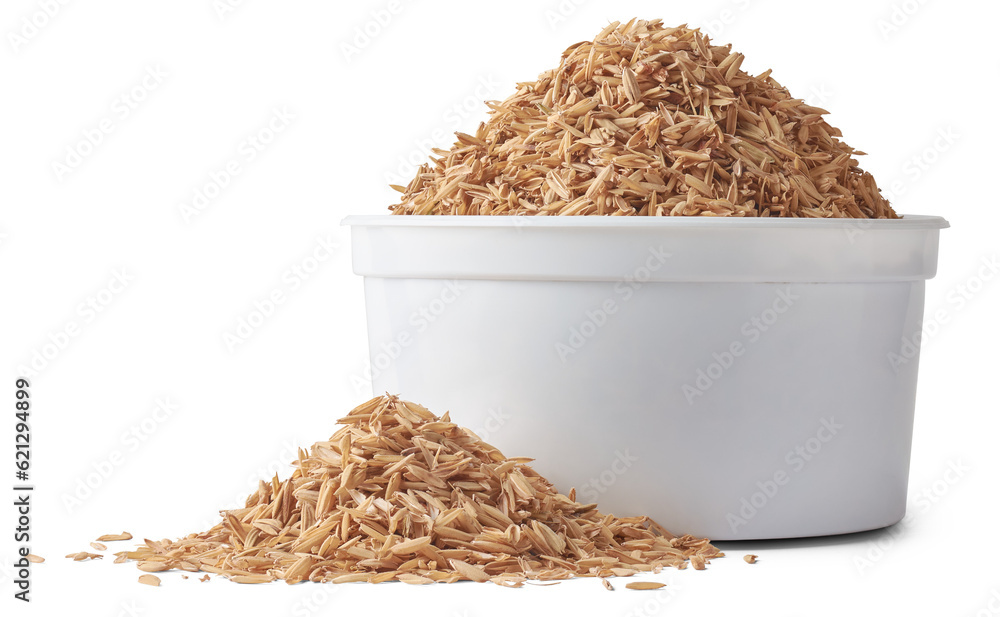 cup of paddy husk or rice husk, aka yellow rice chaff, rice husk or ...
