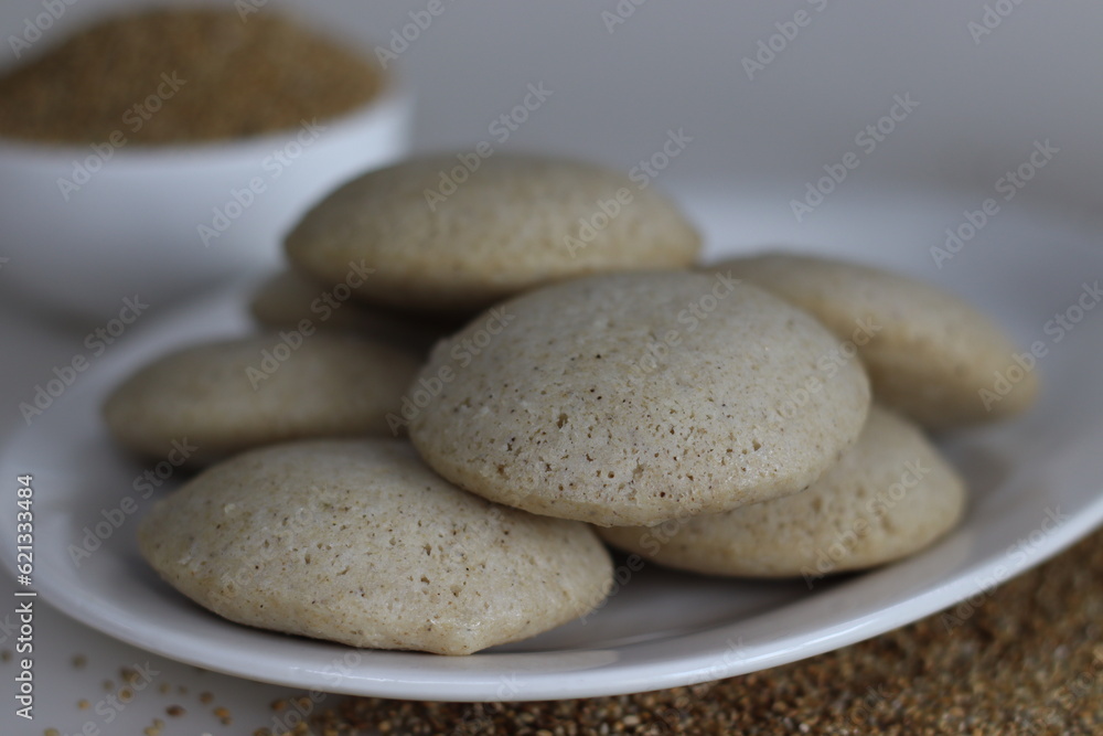 Bajra idly. Steamed savory rice cake made by a batter of fermented de ...