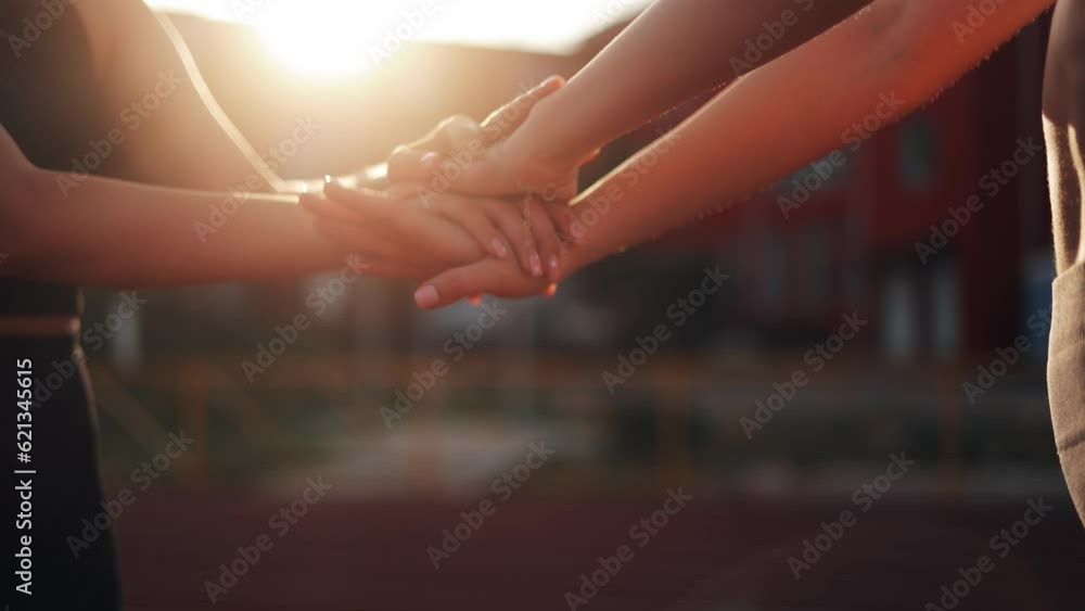Young female athletes after training, hands together and teamwork in ...