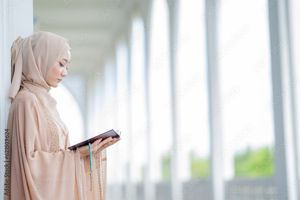 The image of an Asian Muslim woman in the Islamic religion in hijab in ...