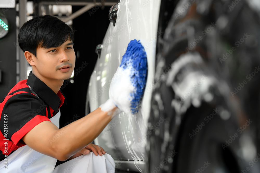 Man Worker use Soap Washing and Taking Care of Vehicle car body with ...