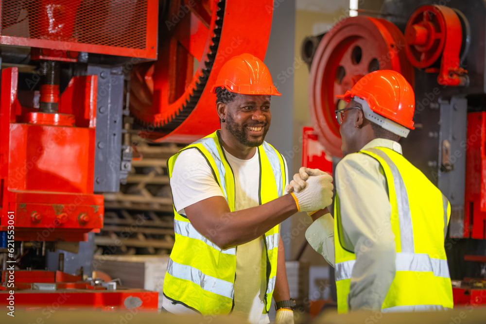 Teamwork African American worker in the factory. Black man afro work ...