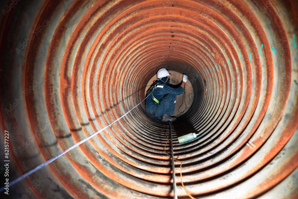 Photo & Art Print Male worker inspection measured the coil pipe ...