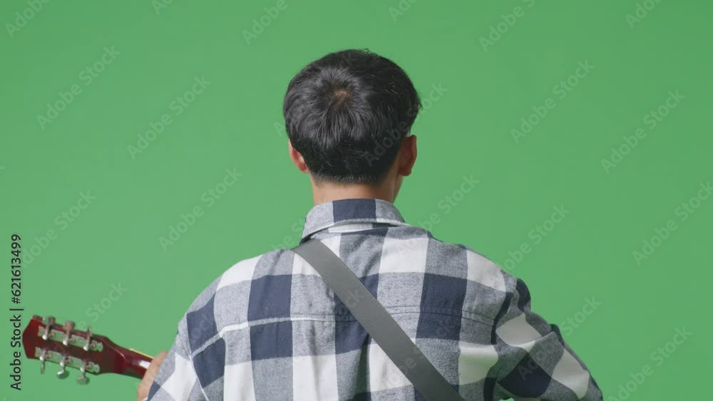 Close Up Back View Of Young Asian Teen Boy Playing Guitar With Rock ...