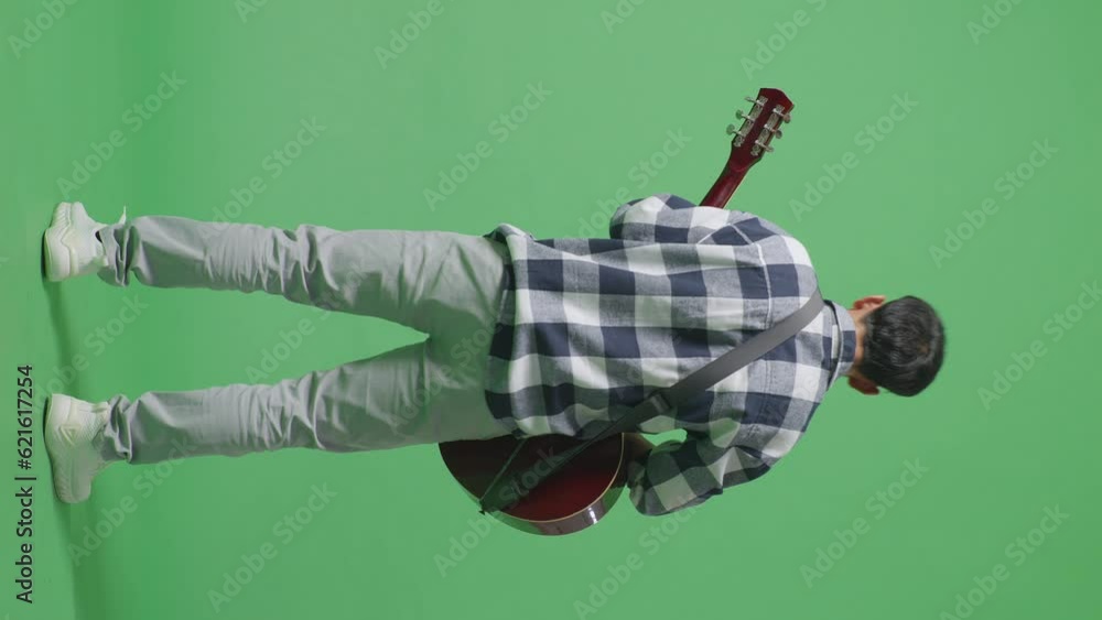 Full Body Back View Of Young Asian Teen Boy Playing Guitar With Rock ...