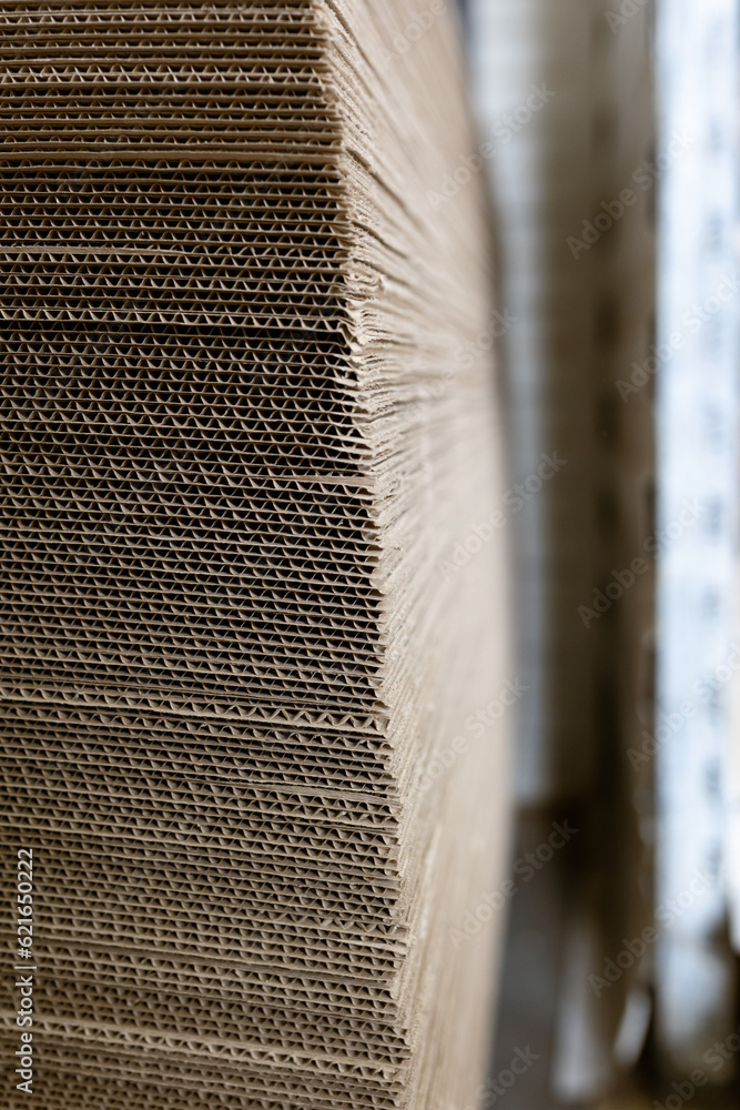 A cardboard sheets in stack. Perforated sheets of corrugated cardboard ...