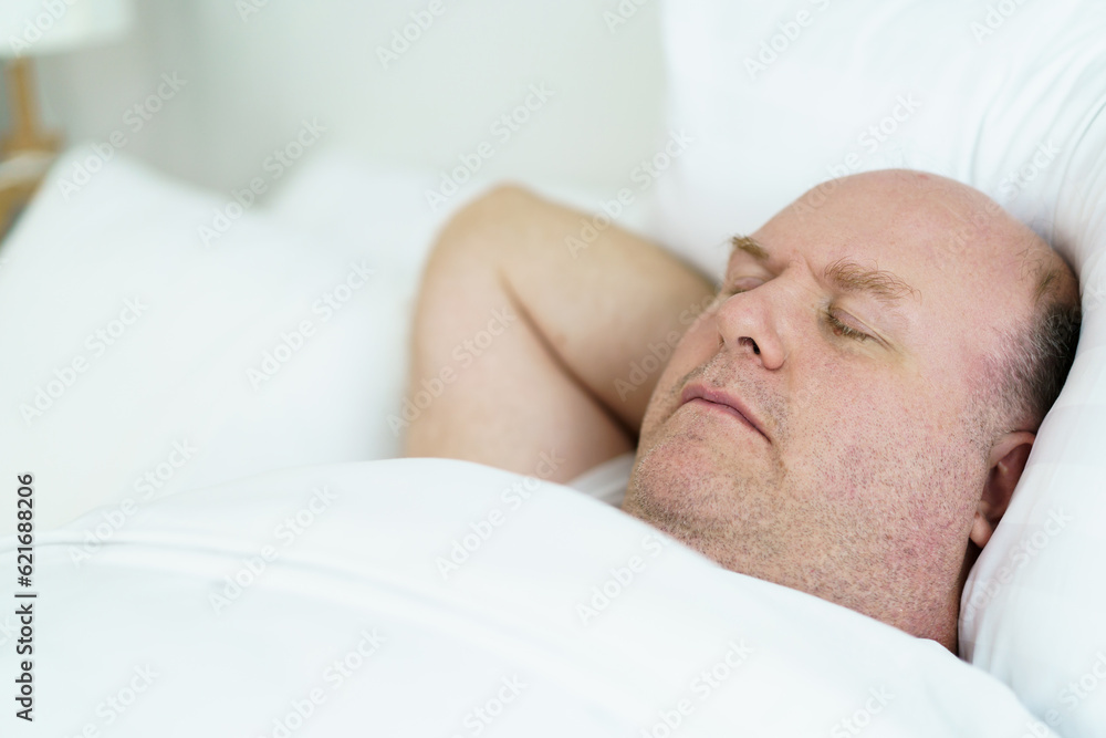 Caucasian white oversize body - fat man sleeping on the bed in bedroom ...
