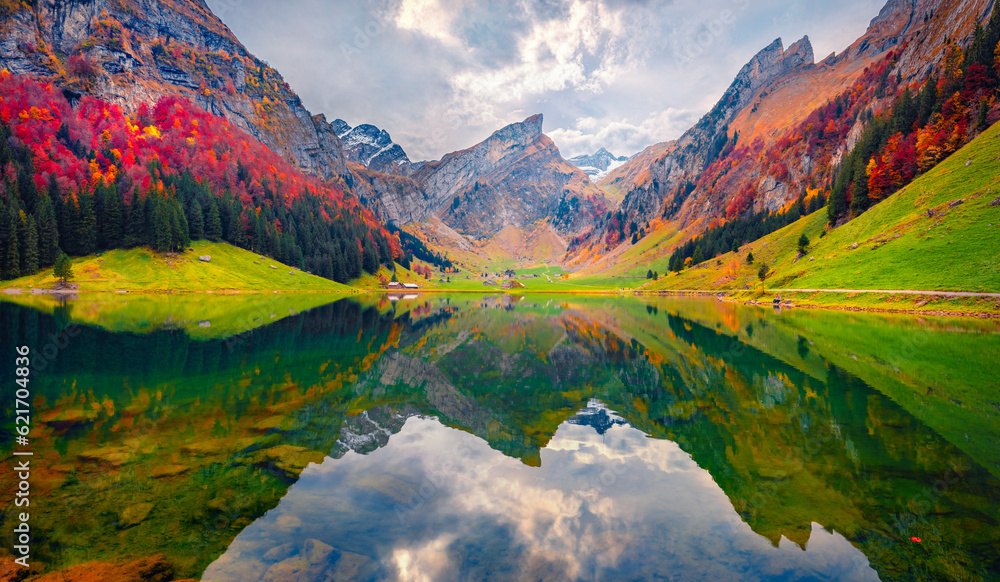 Majestic autumn view of Swiss Alps. Santis peak reflected in the calm ...