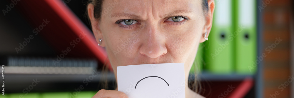 Grumpy woman covering face with paper unhappy emoticon symbol Stock ...