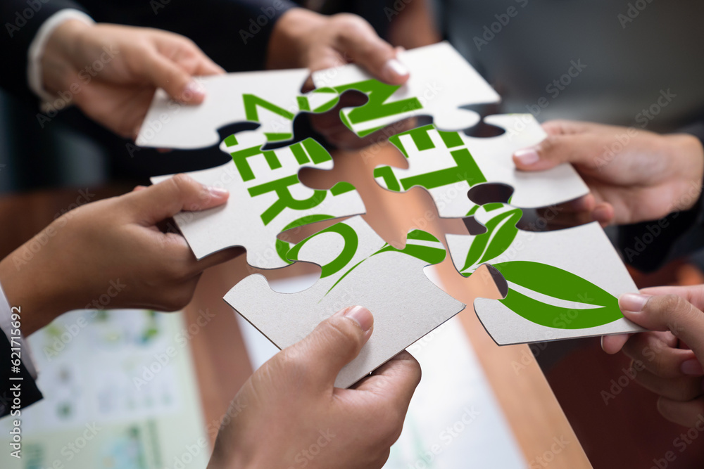 Cohesive group of business people forming jigsaw puzzle pieces in net ...