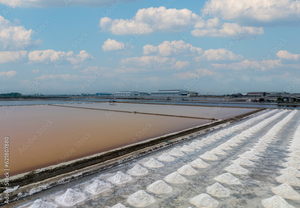 Aerial view of sea salt farm. Pile of brine salt. Raw material of salt ...