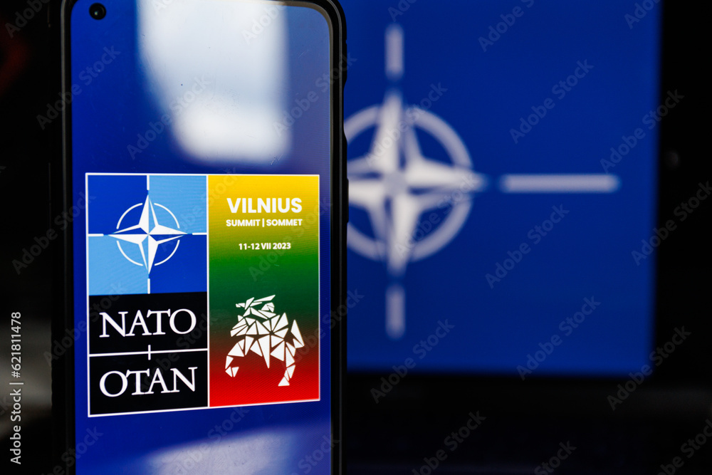 NATO summit Vilnius Logo on screen and Nato flag Stock Photo | Adobe Stock
