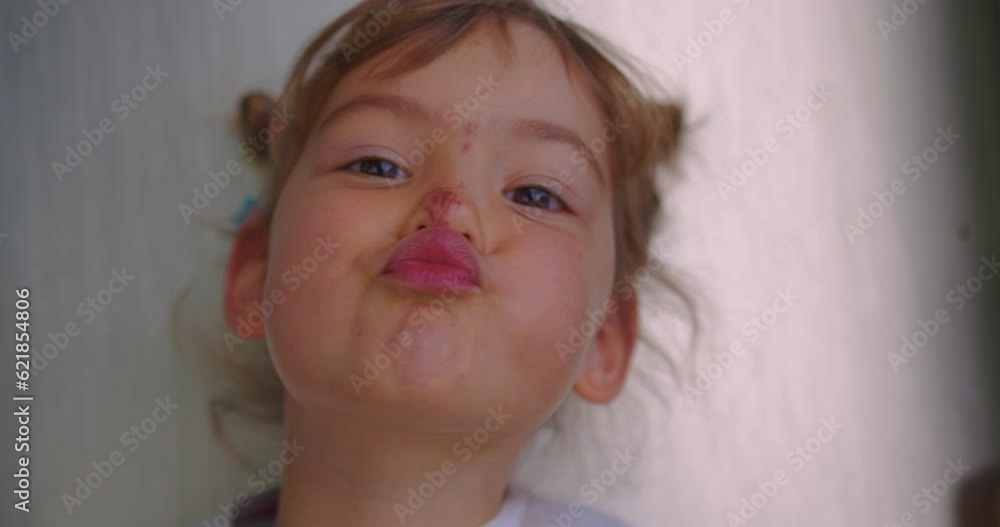 Natural and sincere children's emotions. Portrait of a little girl in ...