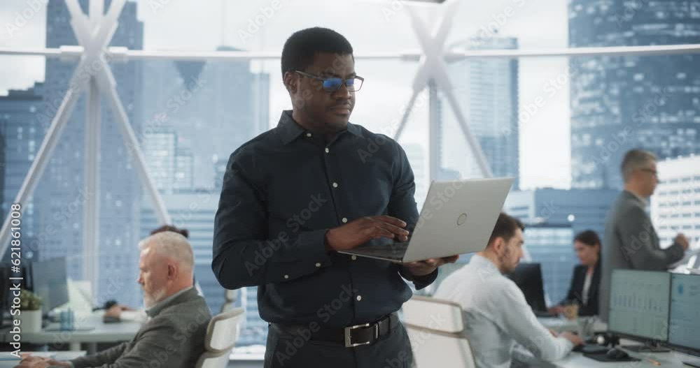 Handsome African American CEO Walking In Modern Skyscraper Office With ...