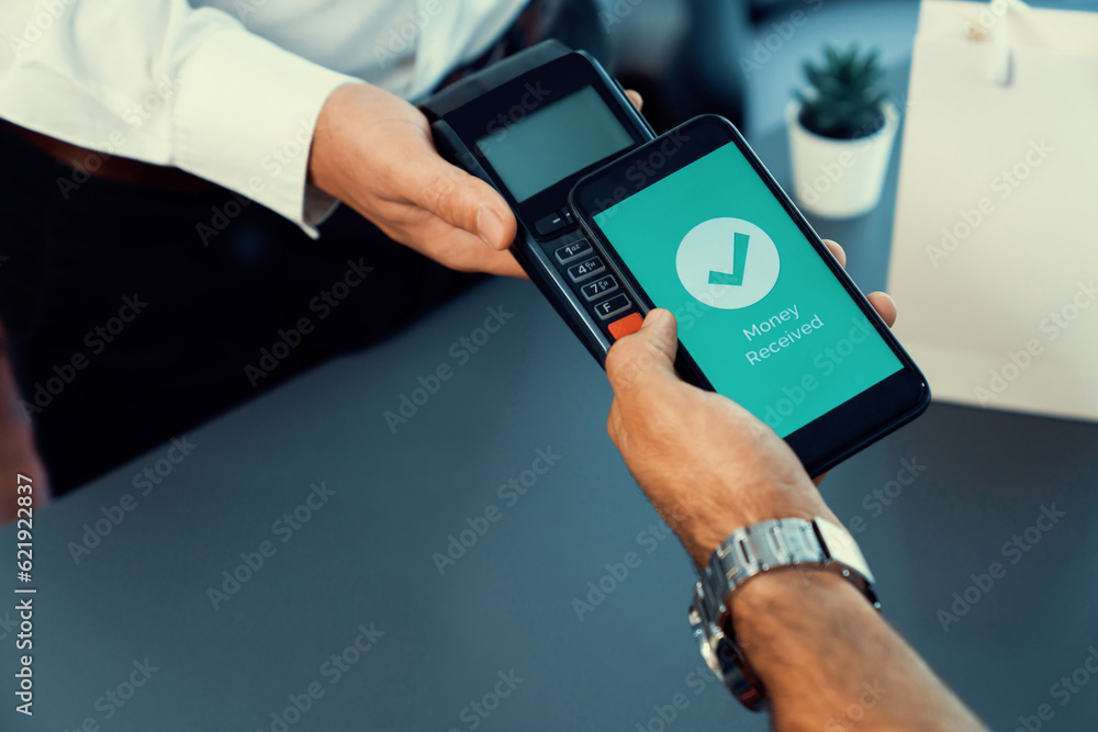 Hand holding smartphone with NFC QR code device, scanning contactless ...