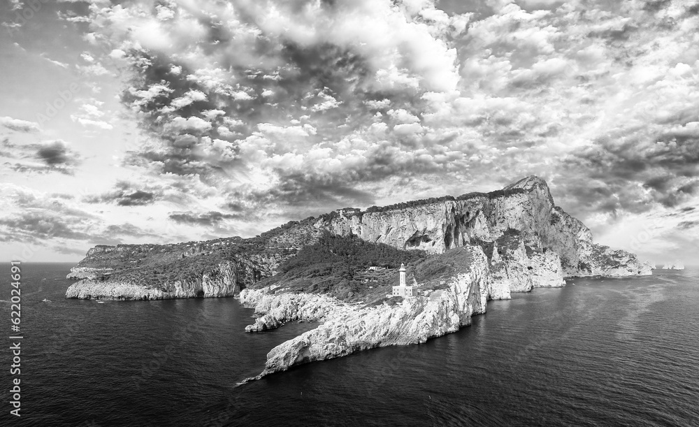 Amazing aerial view of Capri at sunset from a drone flying over ...