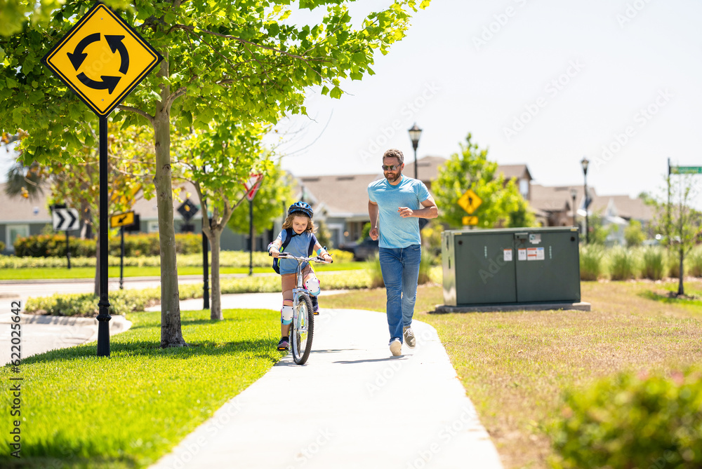father and son navigate the winding paths together at fatherhood ...